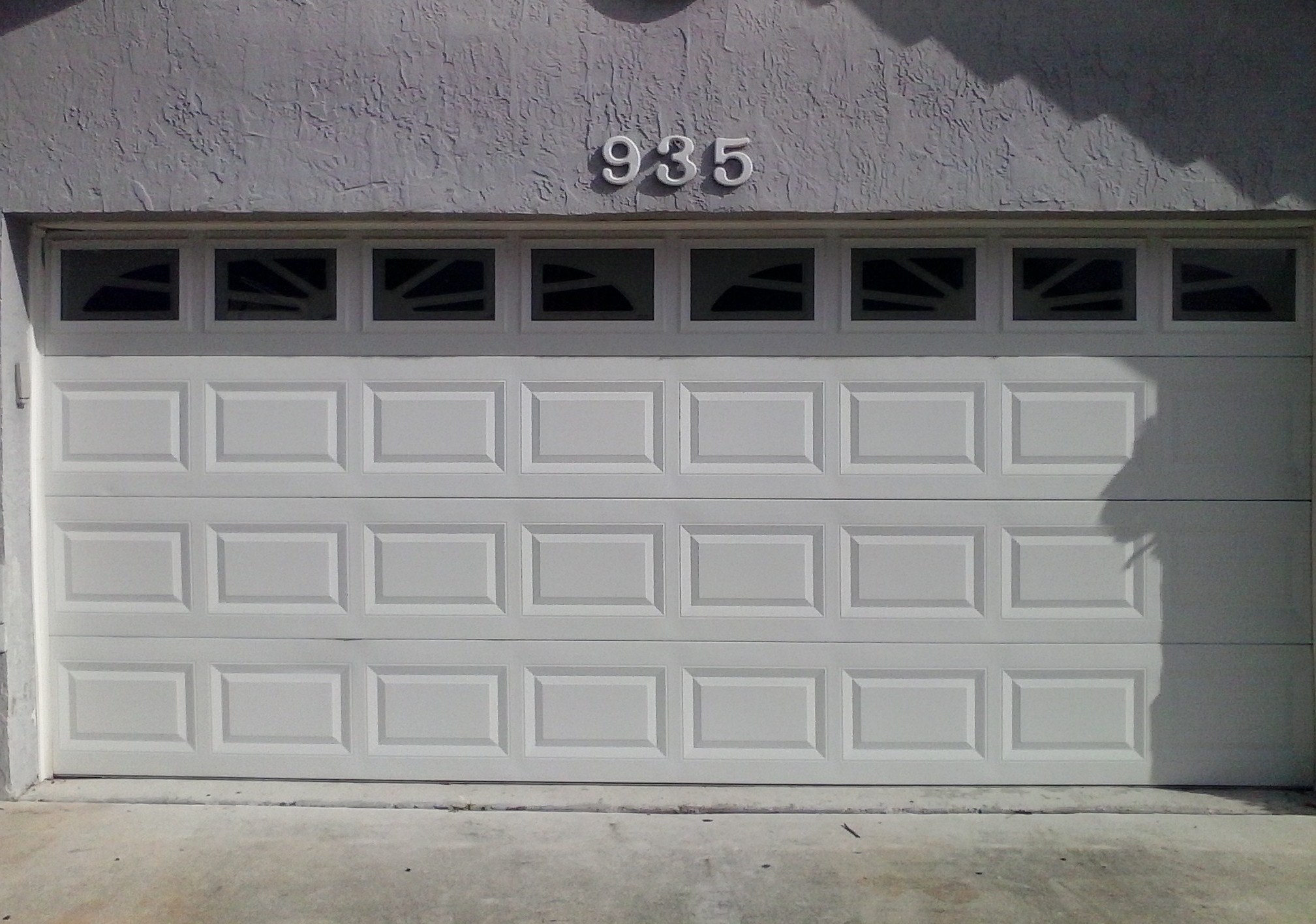 DAB Garage Doors - Cayman Islands Impact Window